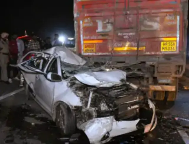 Two killed, one critically injured as car crashes into truck on ...
