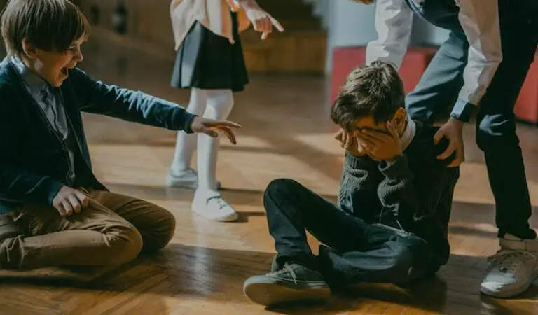 Explainer: Kids learn to bully from adults' threats, manipulation ...