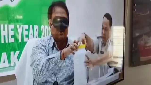 Blindfolded Collector draws lottery for new liquor shop license in ...