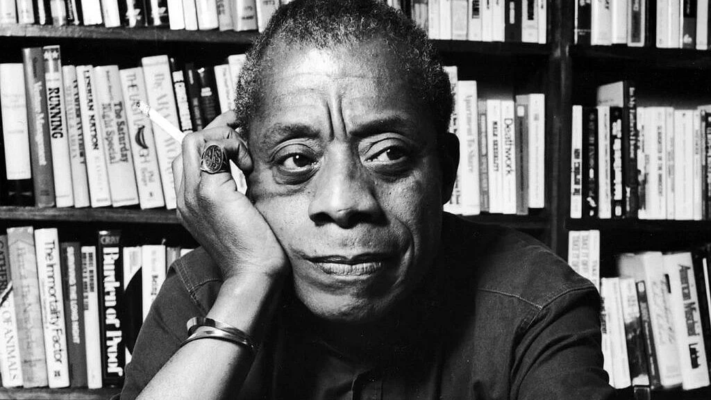 Quote of the day by James Baldwin: "You think your pain and heartbreak ...