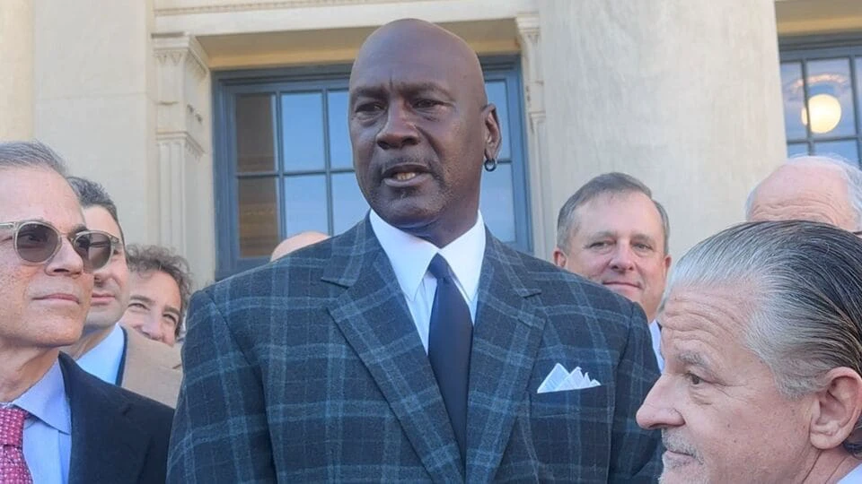 Quote of the day by Michael Jordan: 'Talent wins games, but teamwork ...