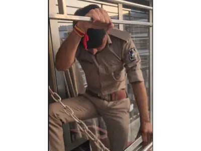 surat policeman climbs seventh-floor grille to rescue man attempting ...