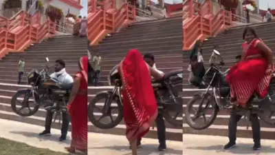 Bahubali or Reckless? Man Lifts Bike with Wife on It, Video Goes Viral ...