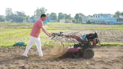 Uttarakhand Chief Minister Dhami Operates Tiller in Field, Promotes ...