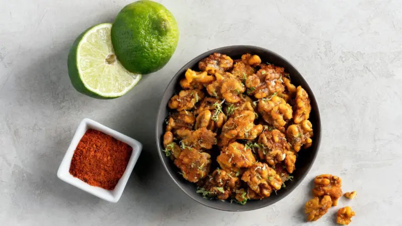 Recipe: Sriracha Honey Lime Walnuts | Dailyhunt