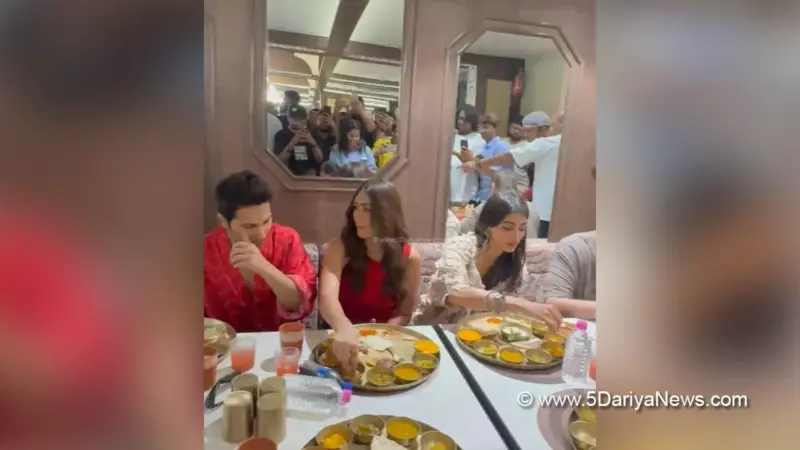 Varun Dhawan feeds Mrunal Thakur & Pooja Hegde as the three enjoy a ...
