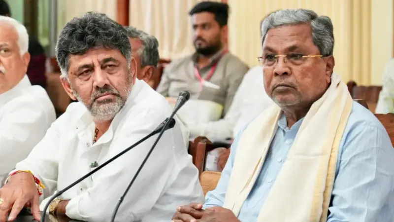 DKS, Siddaramaiah reach Delhi for cabinet talks with Congress high ...